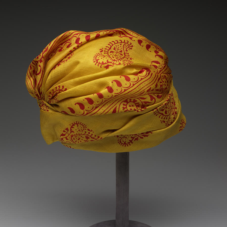 Yellow-patterned silk turban-style hat | RISD Museum